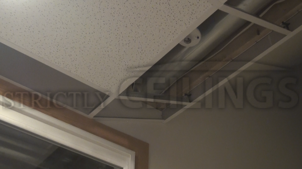 Stairwell Ceiling Slopes Showroom | Pictures Of Basement Drop Ceiling ...